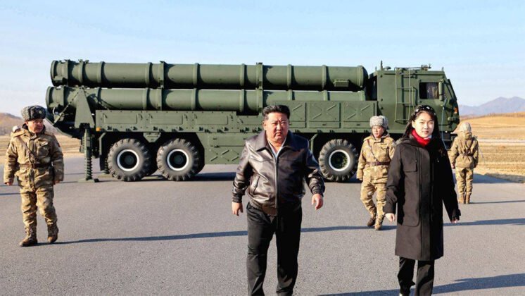 N. Korea test-fires large-caliber multiple rocket launcher with Kim in ...